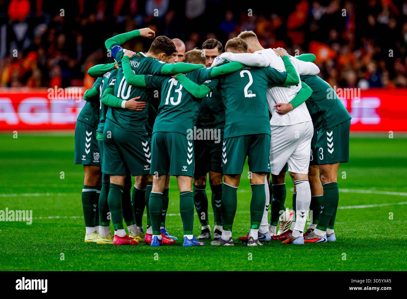 team of Lithuania form a huddle during the FIFA World Cup 2026 ...
