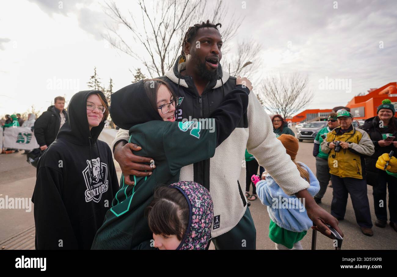 Saskatchewan Roughriders offensive lineman Jermarcus Hardrick embraces ...
