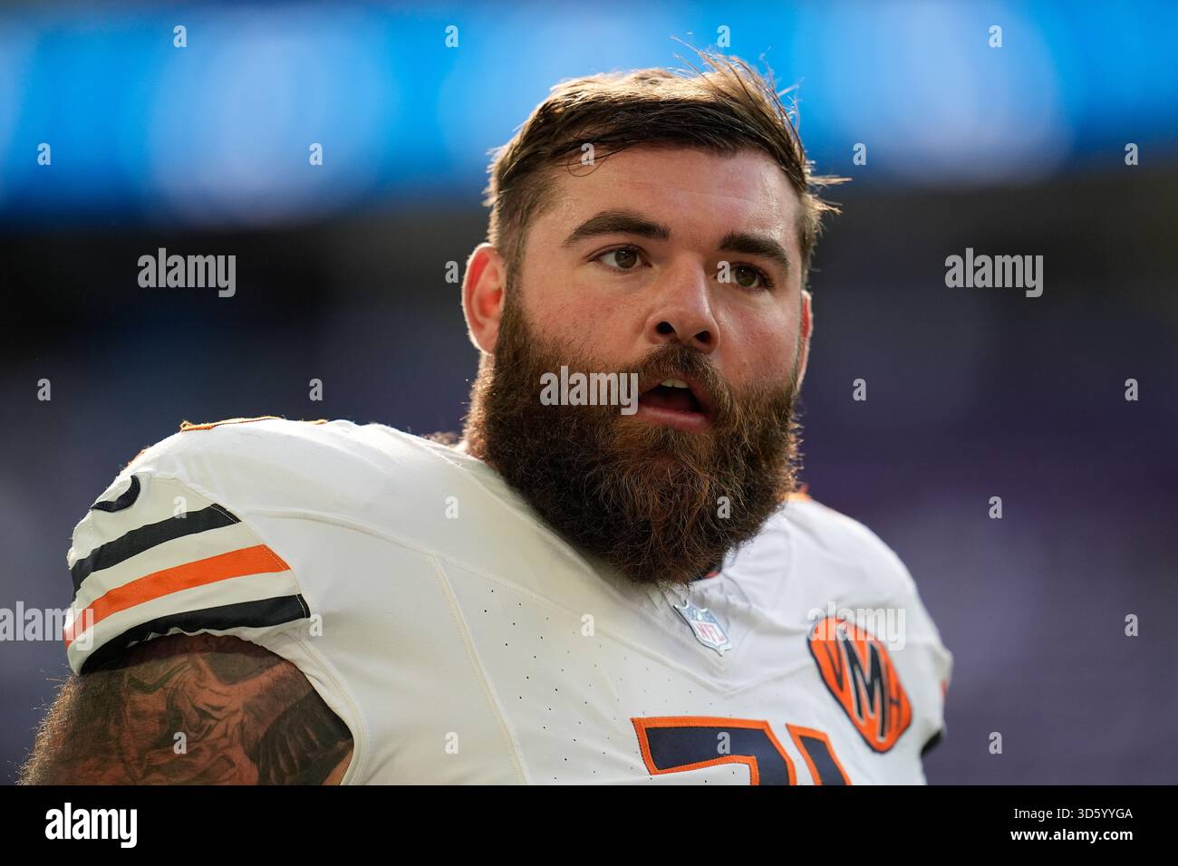 Chicago Bears offensive tackle Ryan Bates (71) walks across the field ...