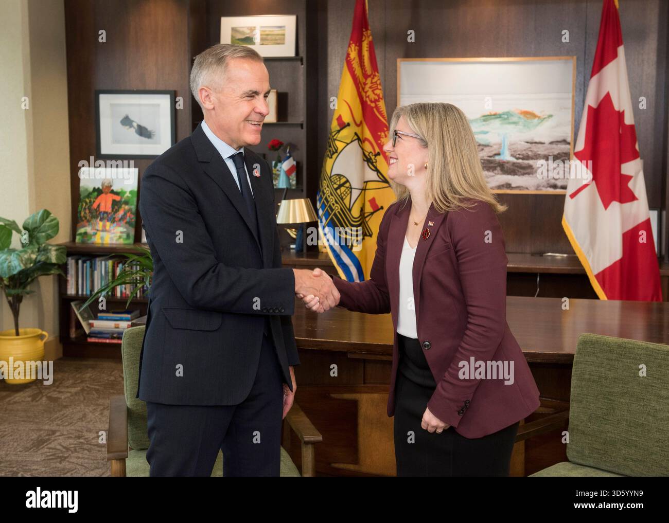 Prime Minister Mark Carney left, meets with New Brunswick Premier Susan ...