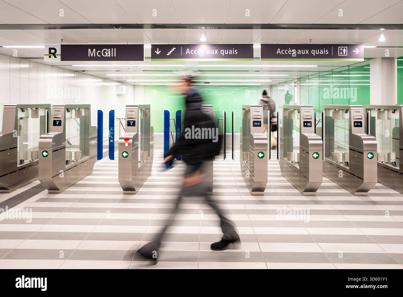 People use the REM light rail system at McGill station, in Montreal ...