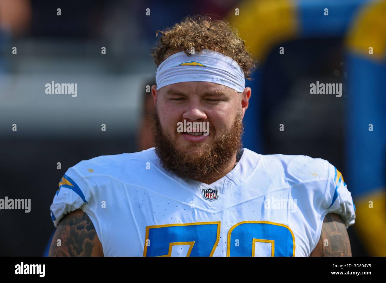 Los Angeles Chargers center Andre James (78) walks the sideline before ...