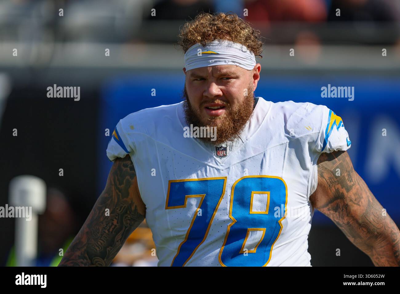 Los Angeles Chargers center Andre James (78) walks the sideline before ...