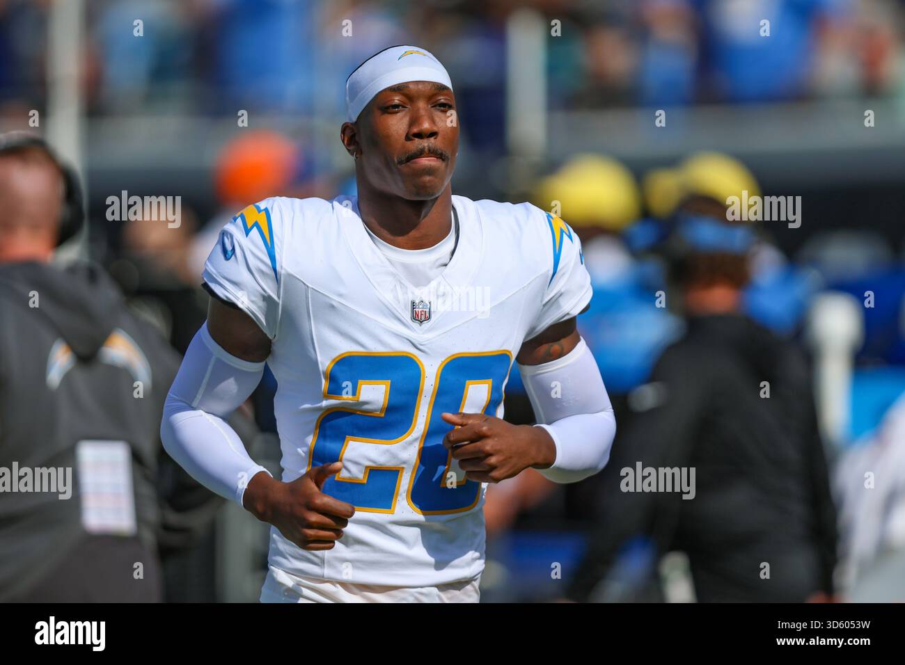 Los Angeles Chargers cornerback Cam Hart (20) walks the sideline before ...