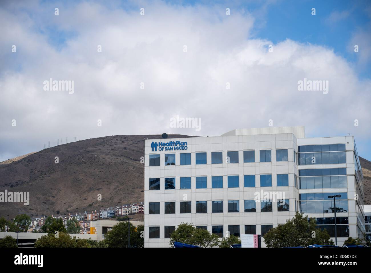 Health Plan of San Mateo office building with logo visible and hillside ...