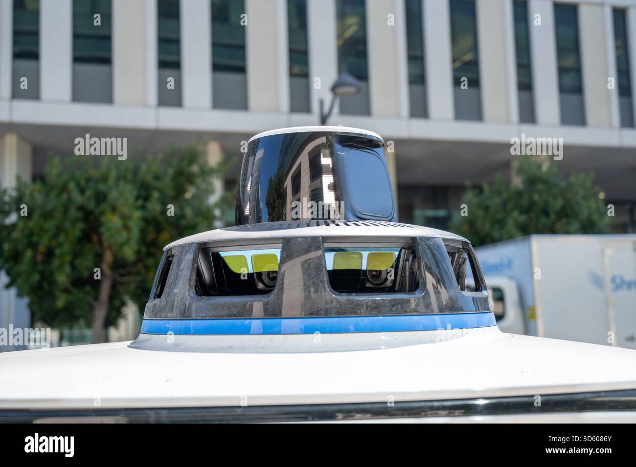 Close-up of lidar sensor array on roof of Waymo autonomous vehicle with ...