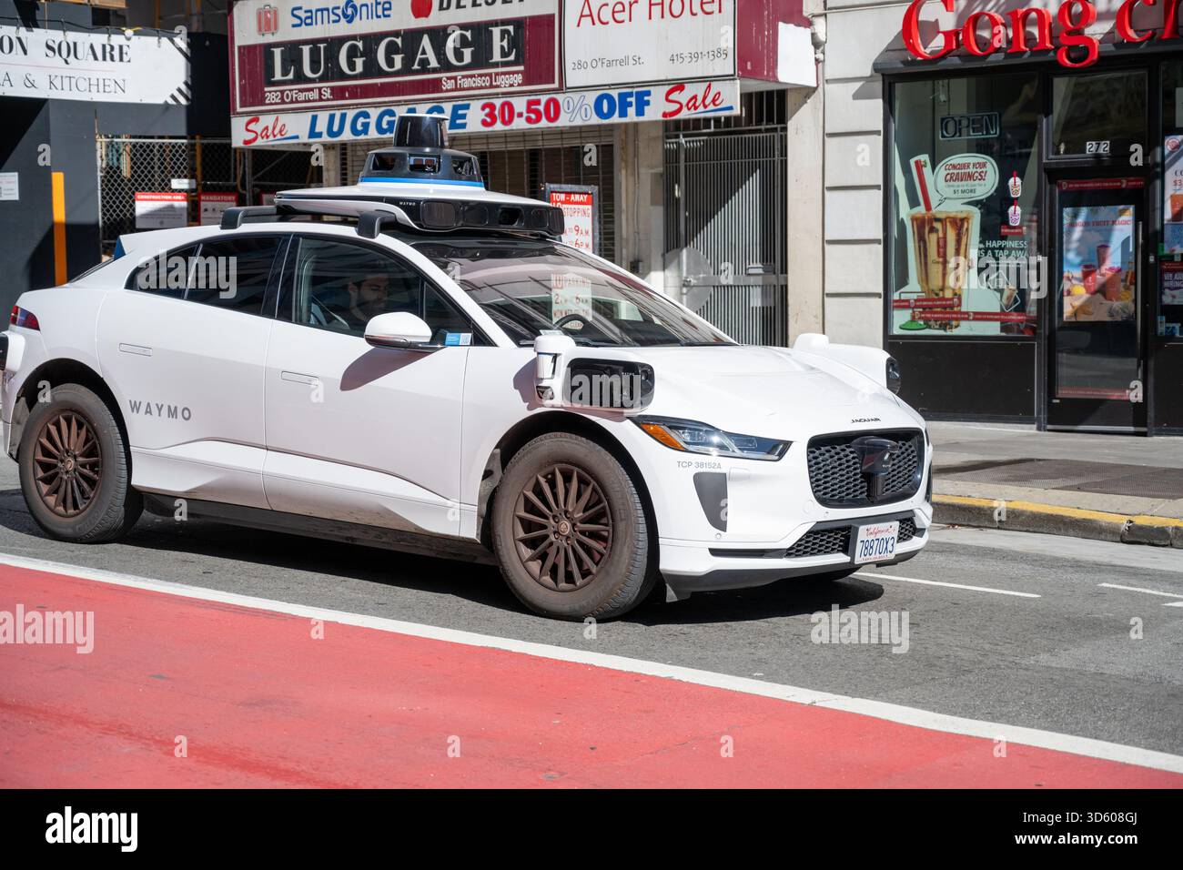 Waymo autonomous Jaguar I-Pace electric SUV with rooftop sensors ...
