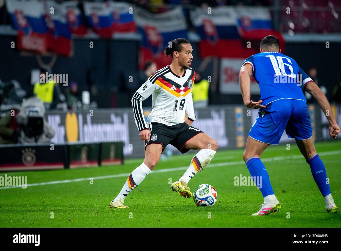 Leroy Sane (Germany, #19) in a duel with David Hancko (Slovakia, #16 ...