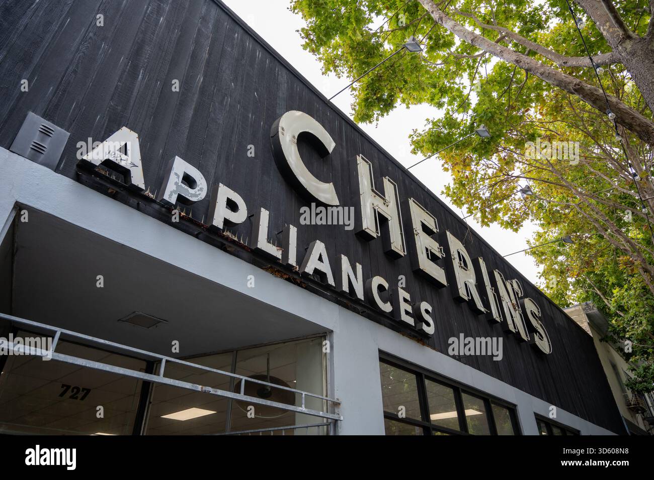 Angled view of Cherin's Appliances storefront with large vintage ...
