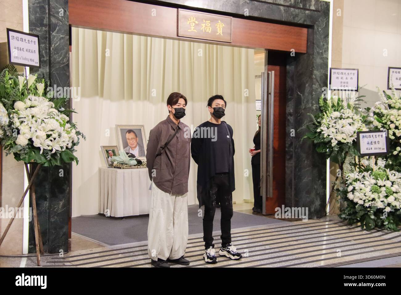 Shaun Tam Chun-yin (L) and Bosco Wong Chung-Chak (R), both Hong Kong actors, arriving at the ...