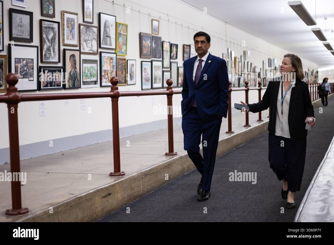 Rep. Ro Khanna (D-Calif.) speaks with a reporter as he walks to a vote ...