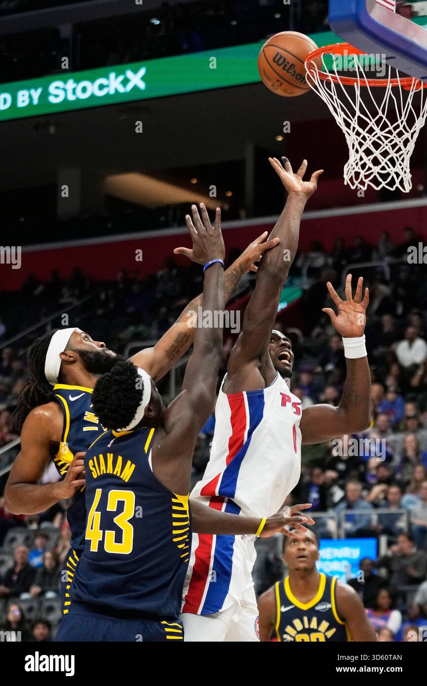 Detroit Pistons center Jalen Duren, right, shoots against Indiana ...