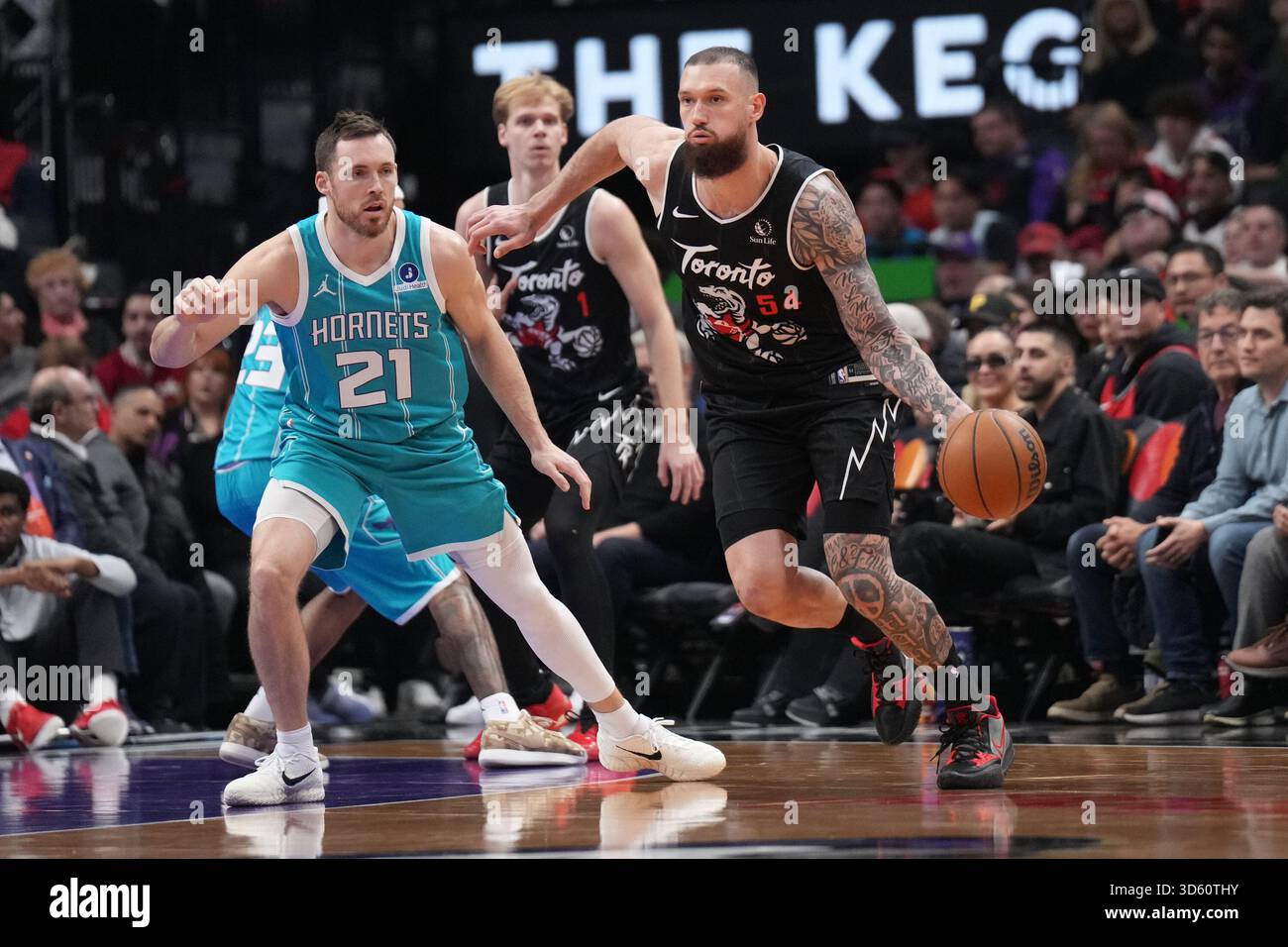 Toronto Raptors forward/center Sandro Mamukelashvili (54) moves around ...