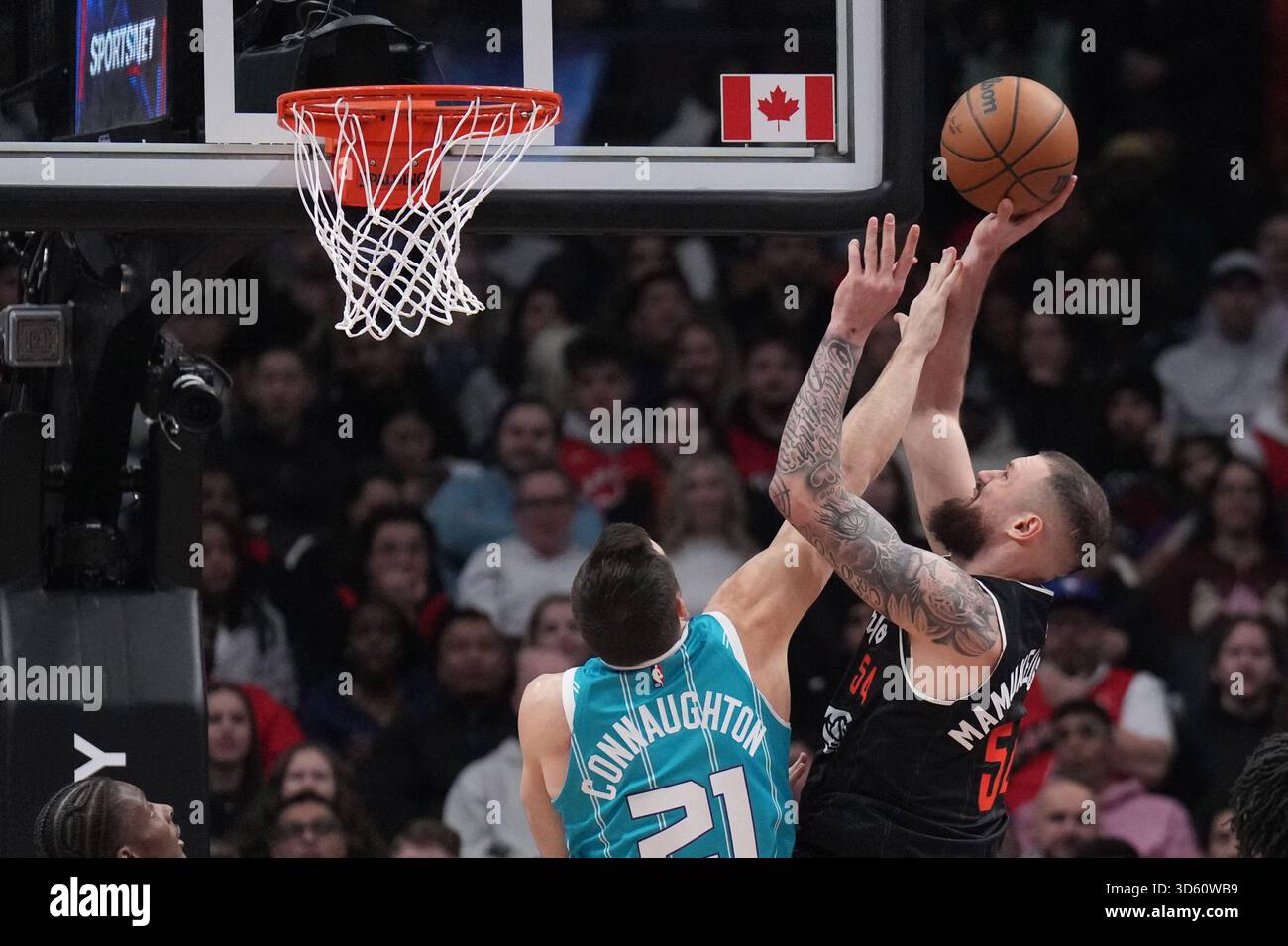Toronto Raptors forward/center Sandro Mamukelashvili (54) shoots over ...