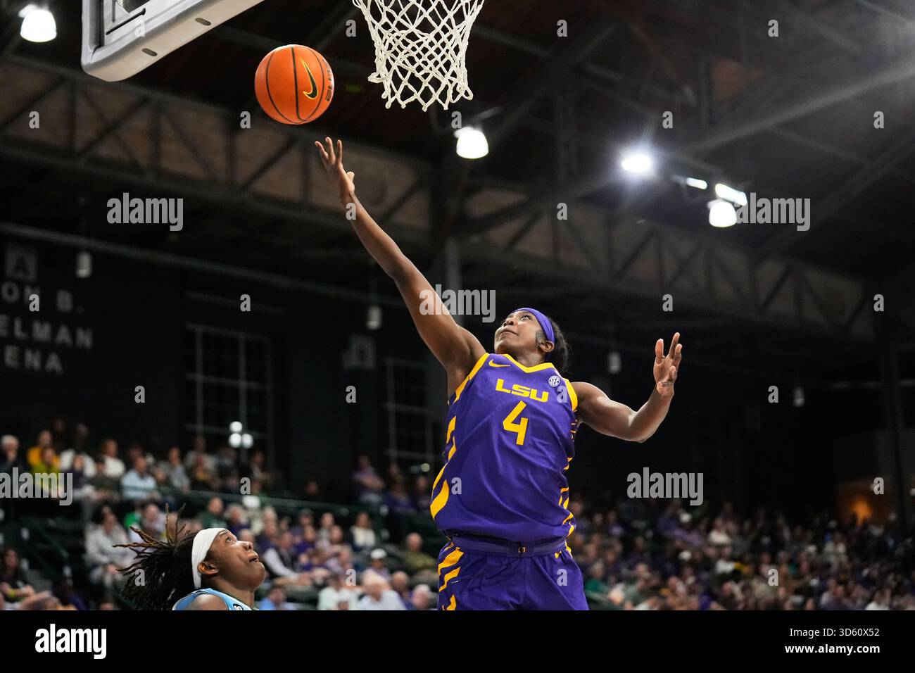 LSU guard Flau'Jae Johnson (4) goes to the basket against Tulane in the ...