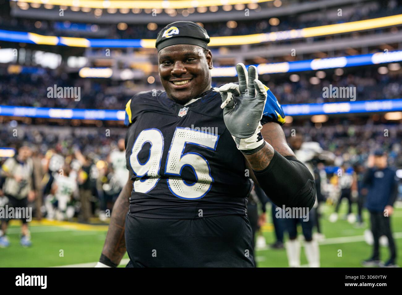 Los Angeles Rams defensive tackle Poona Ford (95) celebrates after a ...