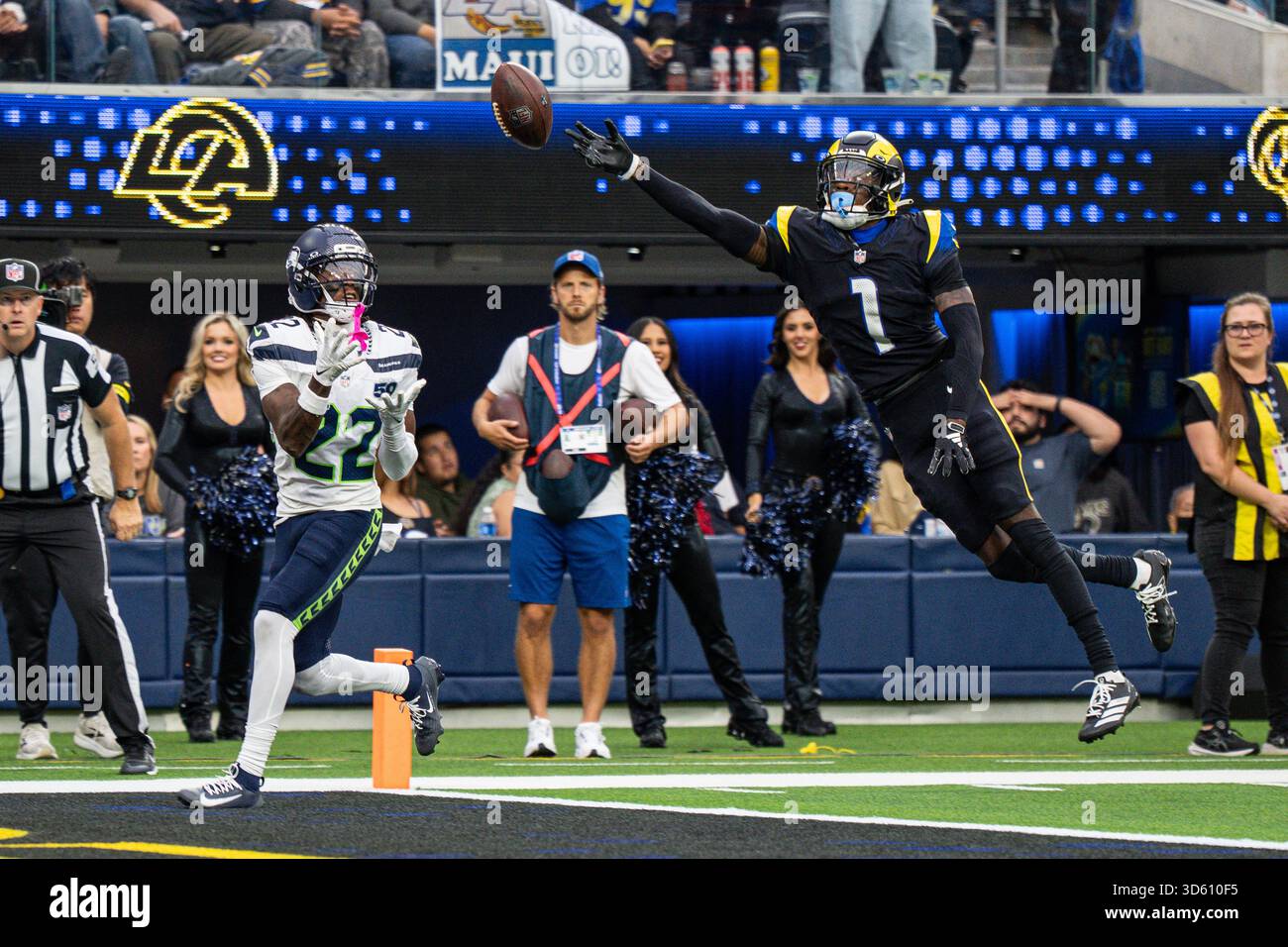 Los Angeles Rams cornerback Emmanuel Forbes Jr. (1) deflects a pass ...