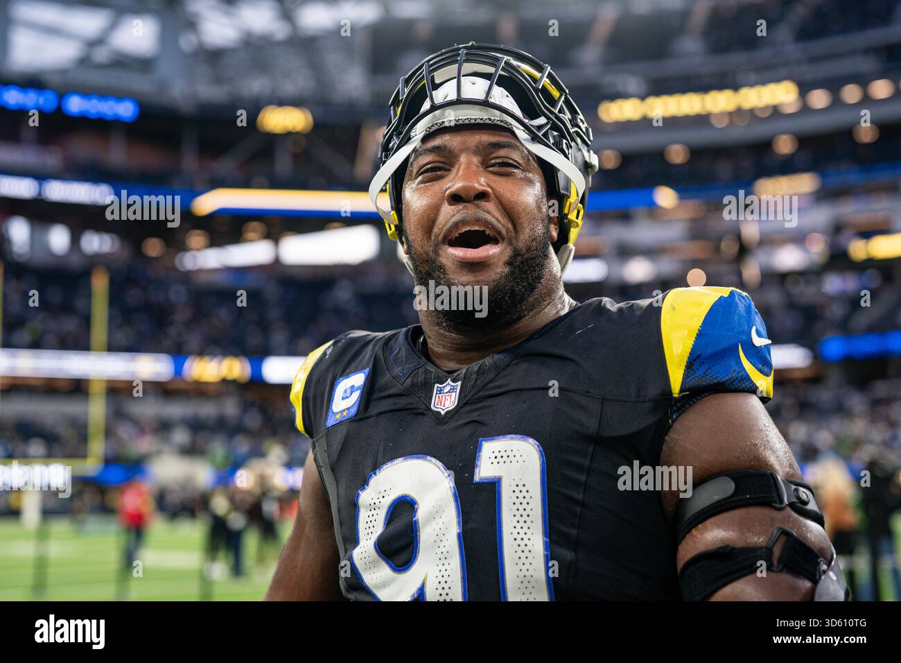 Los Angeles Rams defensive end Kobie Turner (91) celebrates after a NFL ...