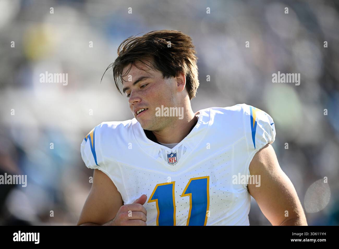 Los Angeles Chargers place kicker Cameron Dicker (11) leaves the field ...