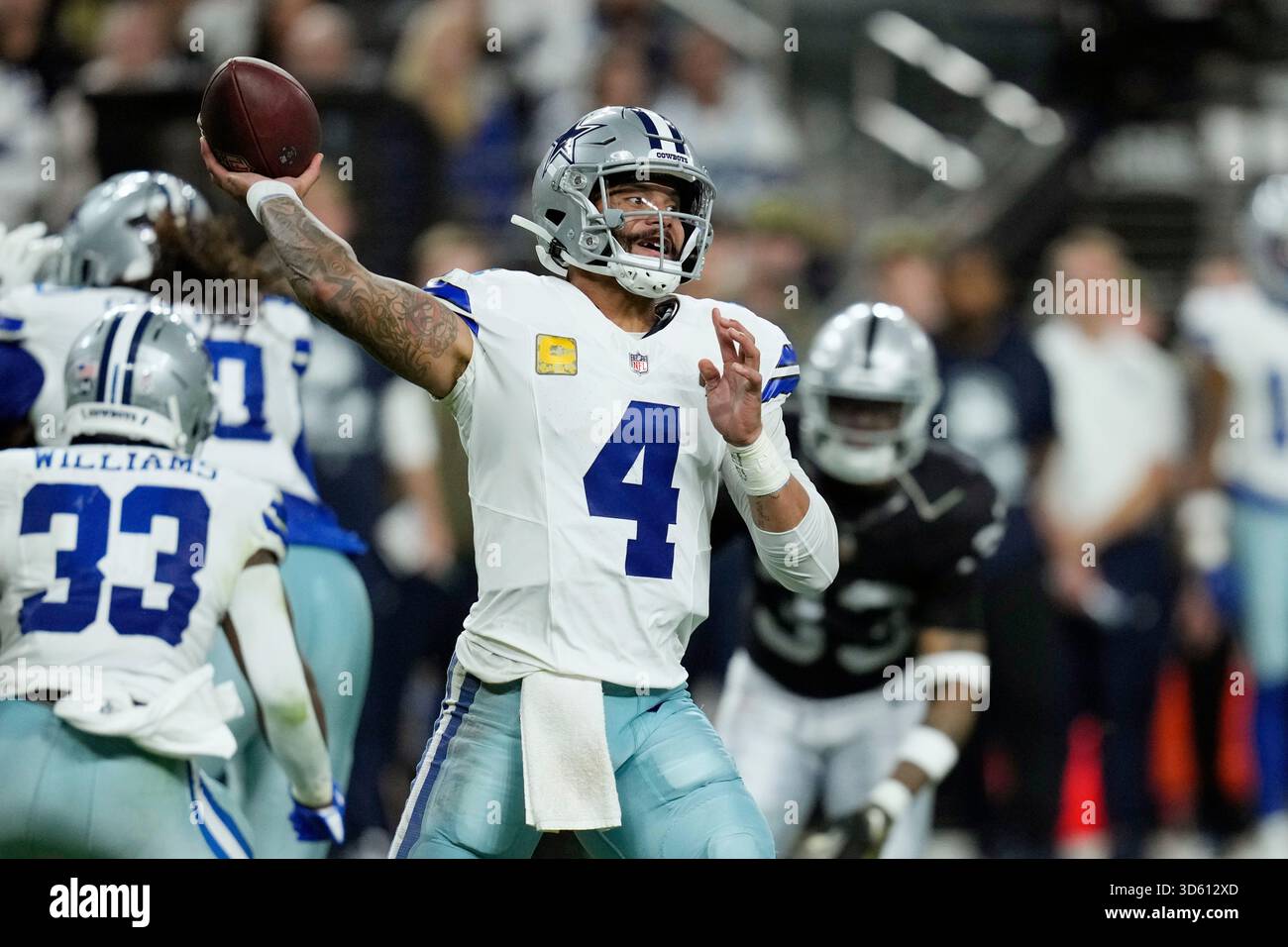 Dallas Cowboys quarterback Dak Prescott throws against the Las Vegas Raiders during the first ...