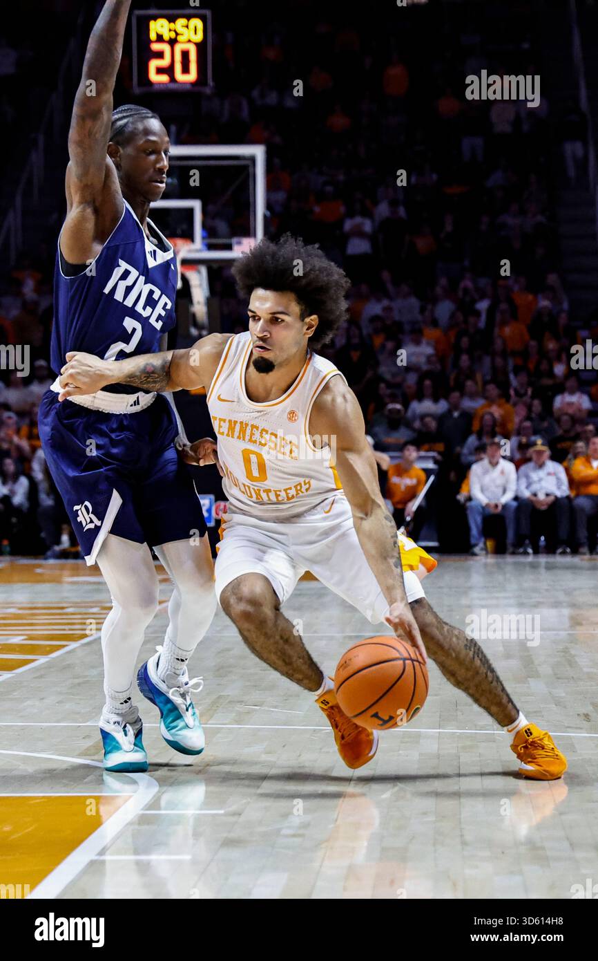 Tennessee guard Ja'Kobi Gillespie (0) drives against Rice guard Jalen Smith (2) during the first ...