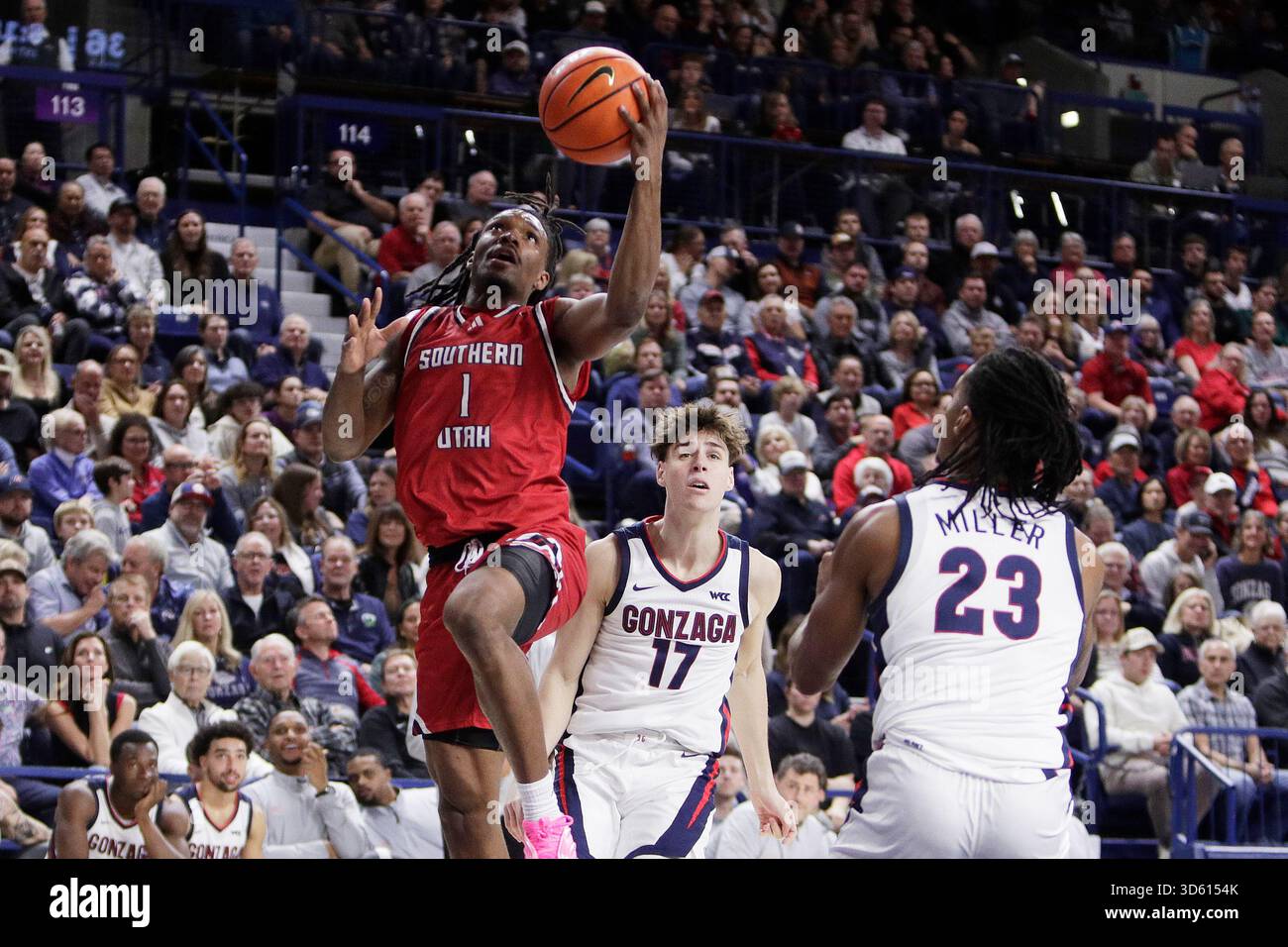 Southern Utah guard Elijah Duval (1) shoots near Gonzaga guards Mario ...