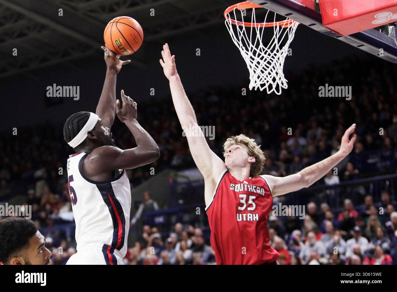 Gonzaga forward Graham Ike, top left, shoots while pressured by ...