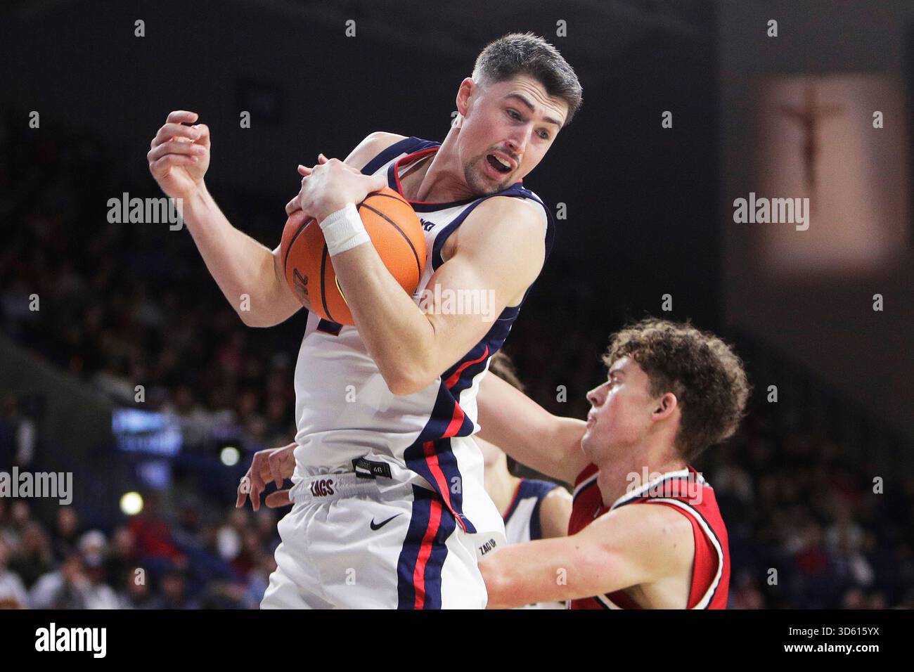 Gonzaga guard Steele Venters, top, grabs a rebound next to Southern ...