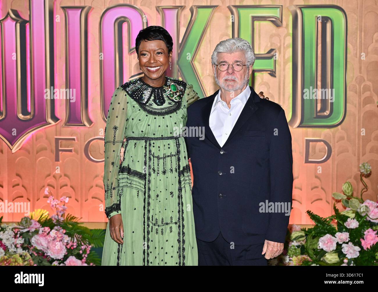 Mellody Hobson, left, and George Lucas attend the premiere of "Wicked ...