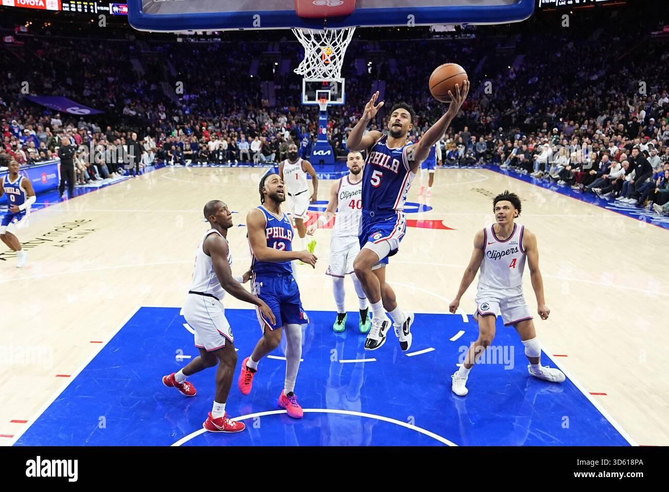 Philadelphia 76ers' Quentin Grimes (5) goes up to shoot against the Los ...