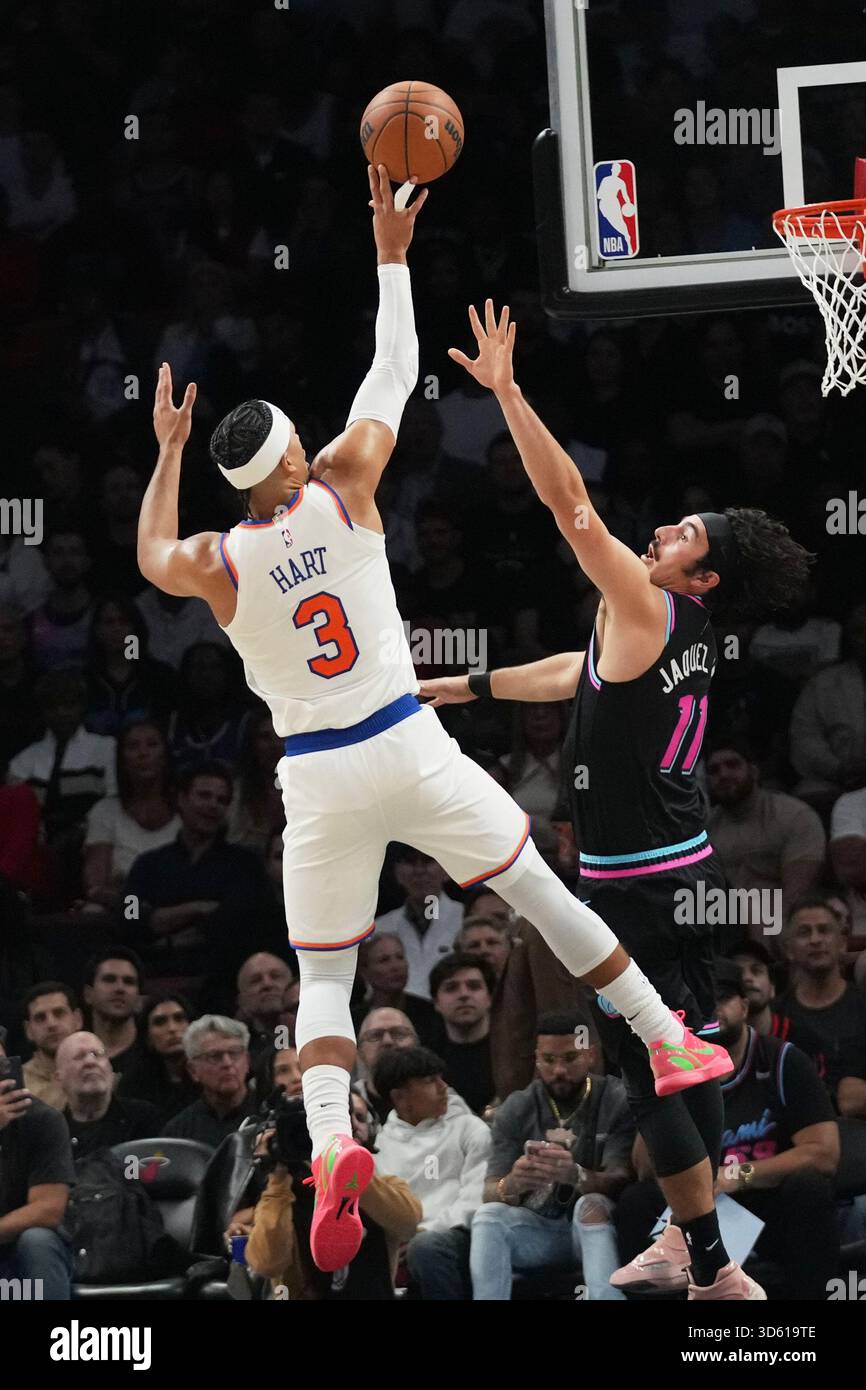 New York Knicks guard Josh Hart (3) shoots as Miami Heat forward Jaime ...
