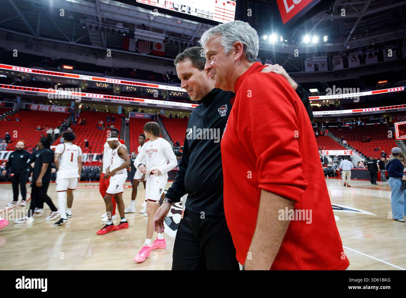 North Carolina State head Coach Will Wade, left, embraces athletic ...