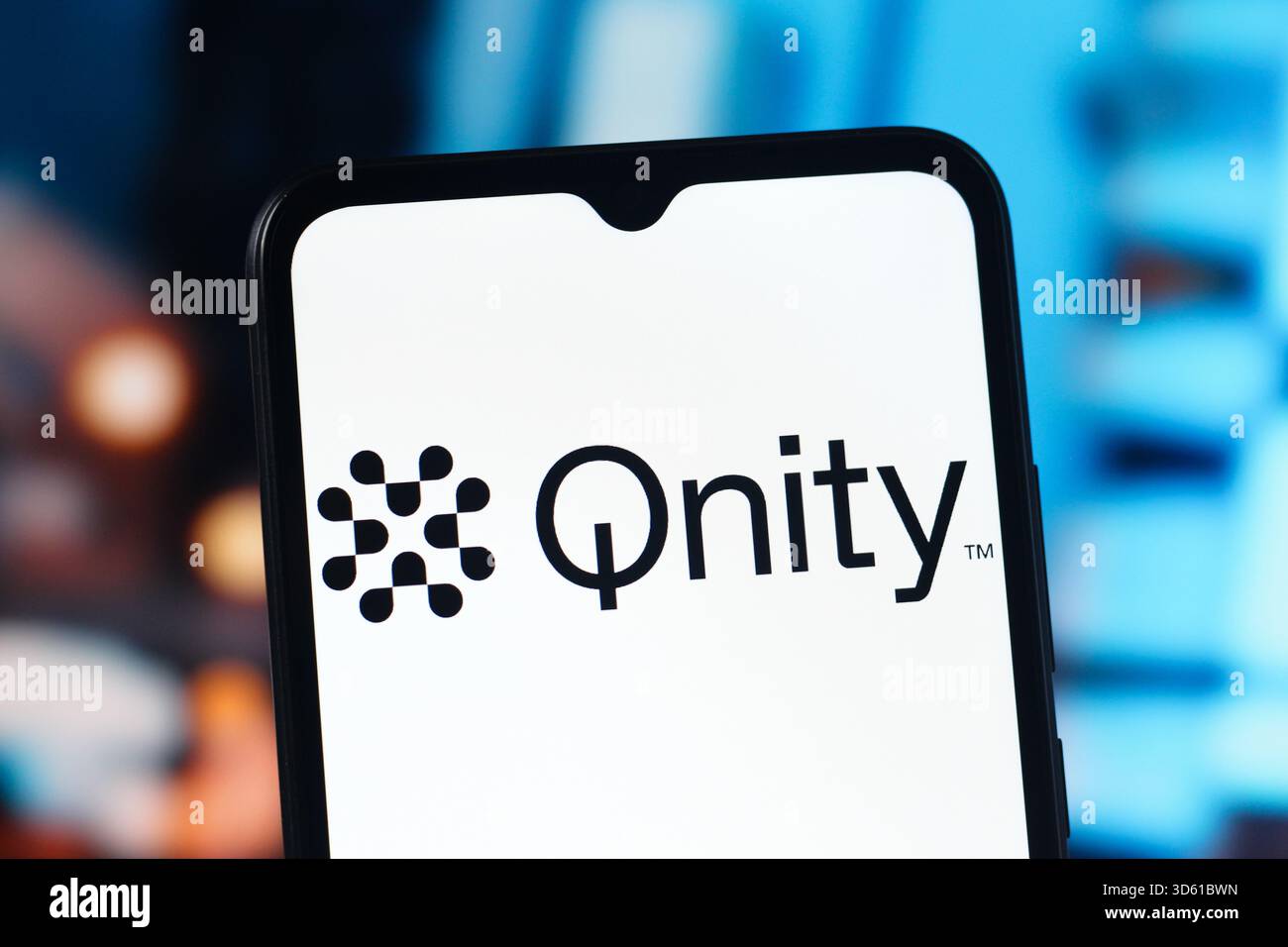 In this photo illustration, the Qnity Electronics logo is seen ...