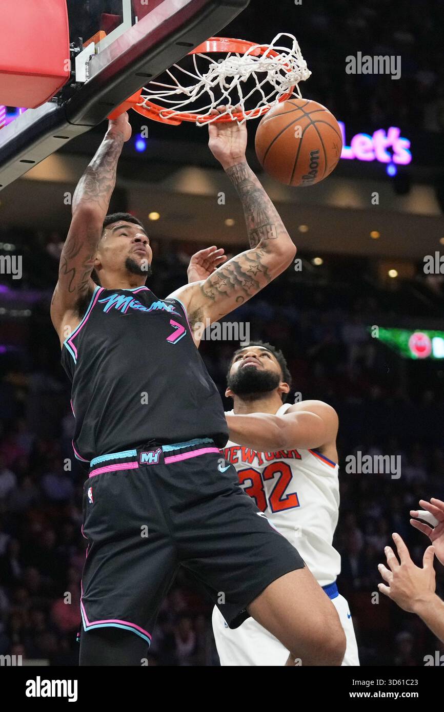 Miami Heat center Kel'el Ware (7) dunks as New York Knicks center Karl ...