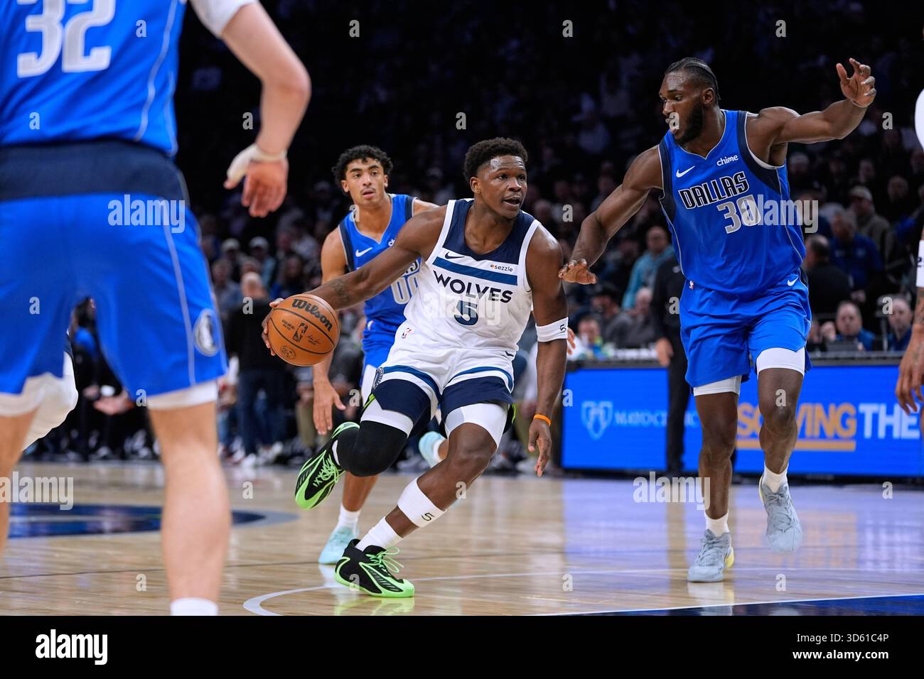 Minnesota Timberwolves guard Anthony Edwards (5) works toward the ...