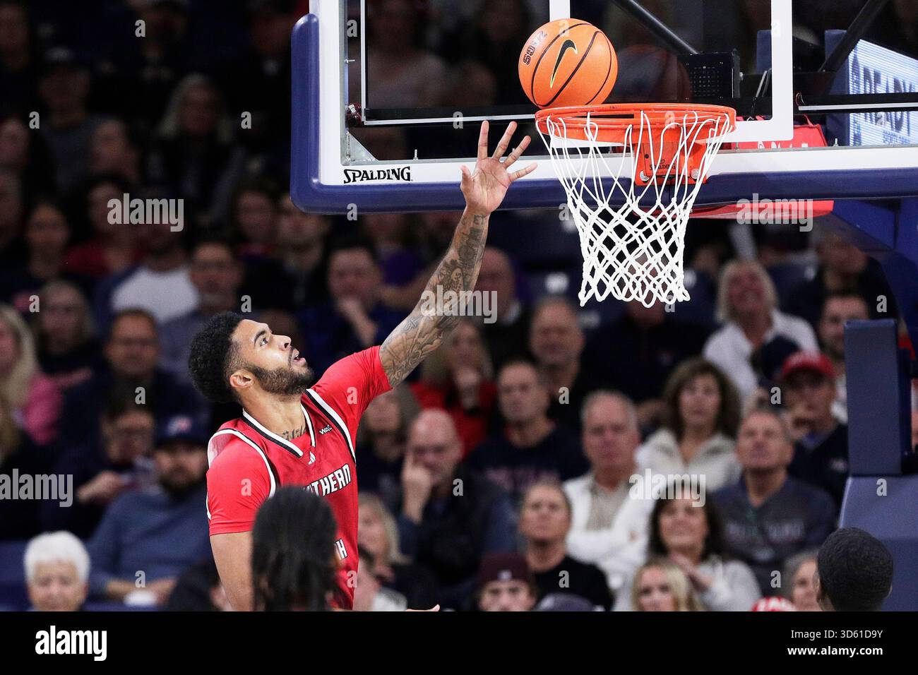 Southern Utah forward Isaiah Cottrell, top, shoots during the second ...