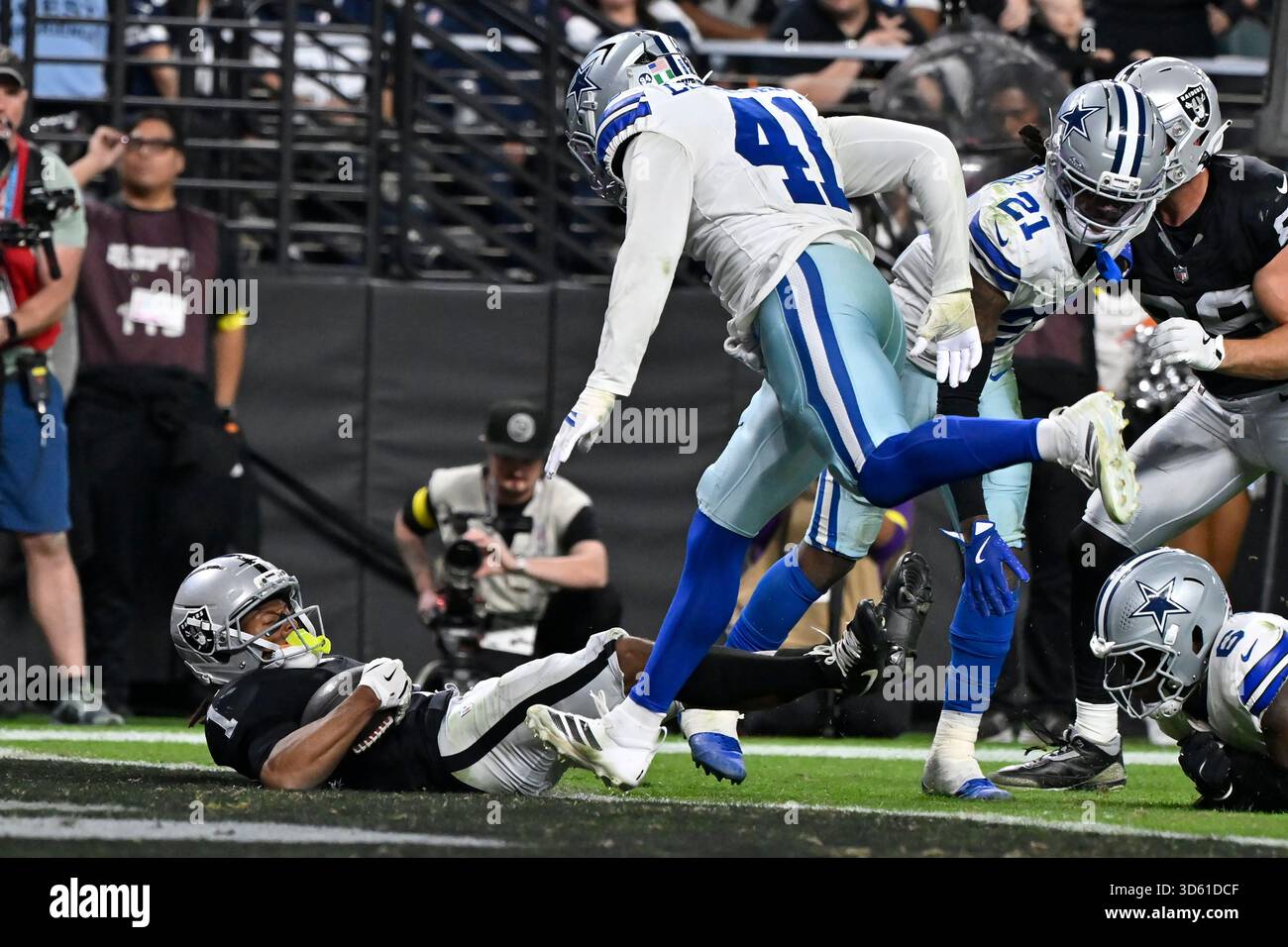 Las Vegas Raiders wide receiver Tre Tucker (1) scores a touchdown as he beats Dallas Cowboys ...