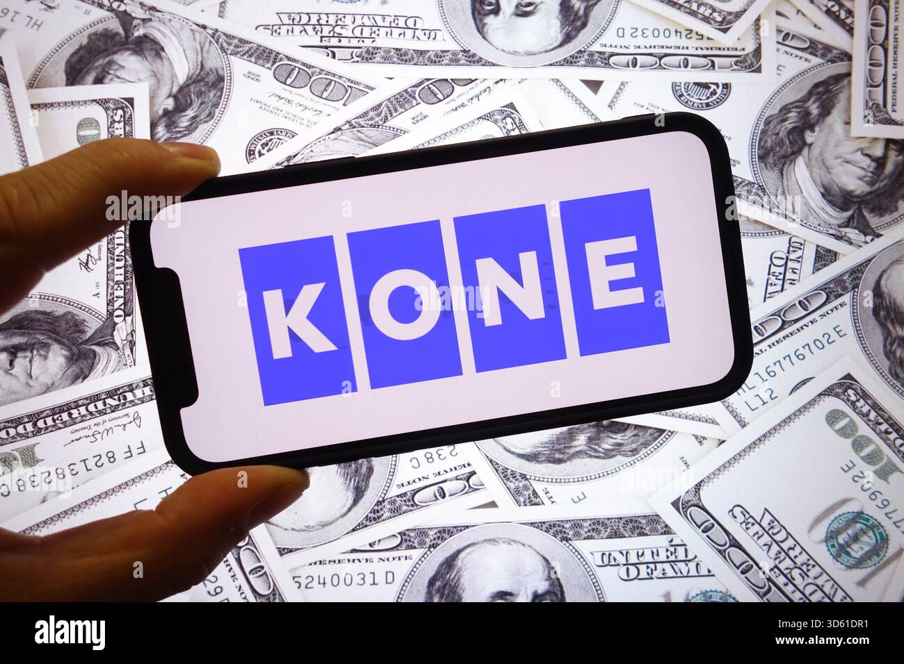 In this photo illustration, the KONE company logo is seen displayed on ...