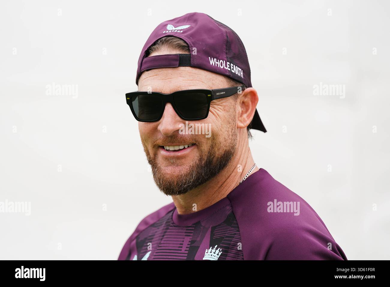 England head coach Brendan McCullum looks on and smiles during a nets ...