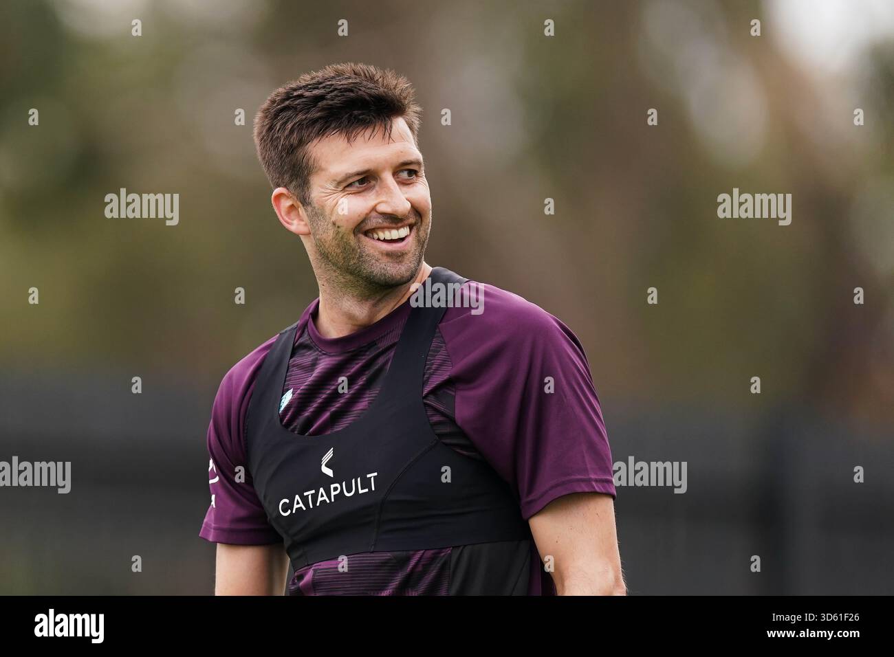 England’s Mark Wood smiles during a nets session at the Optus Stadium ...