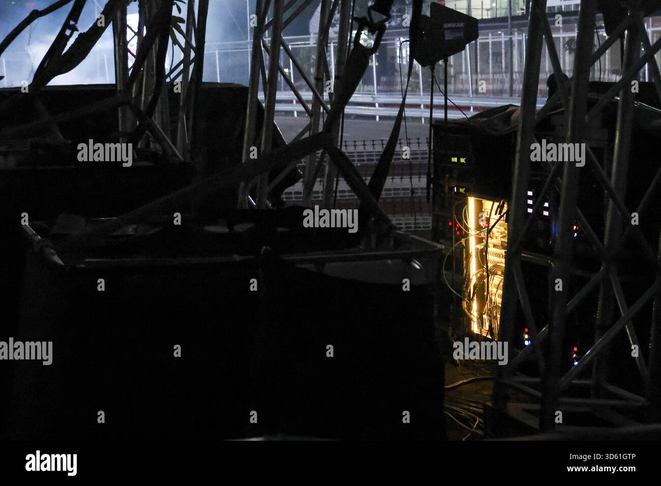 Moody dark night backstage with an urban metal structure. This ...