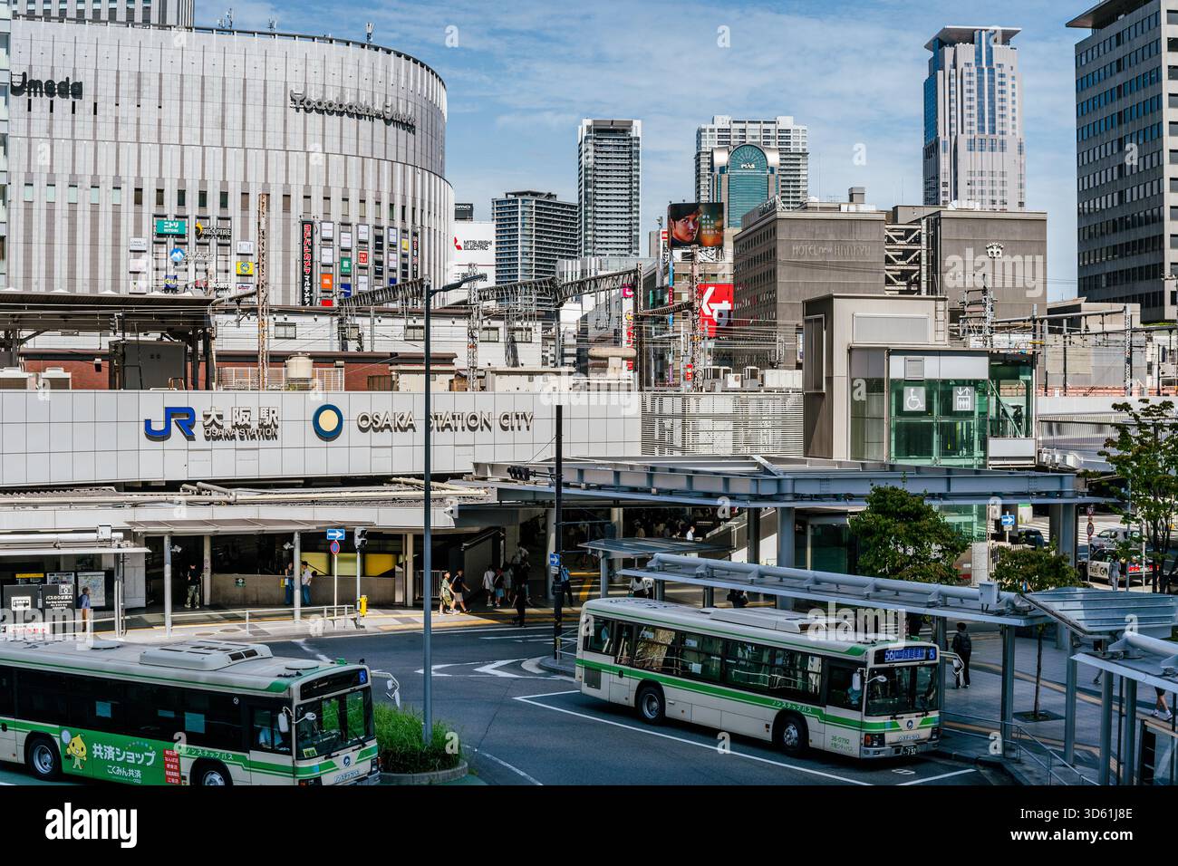 The JR Osaka Station complex, a major transportation hub, is shown with ...