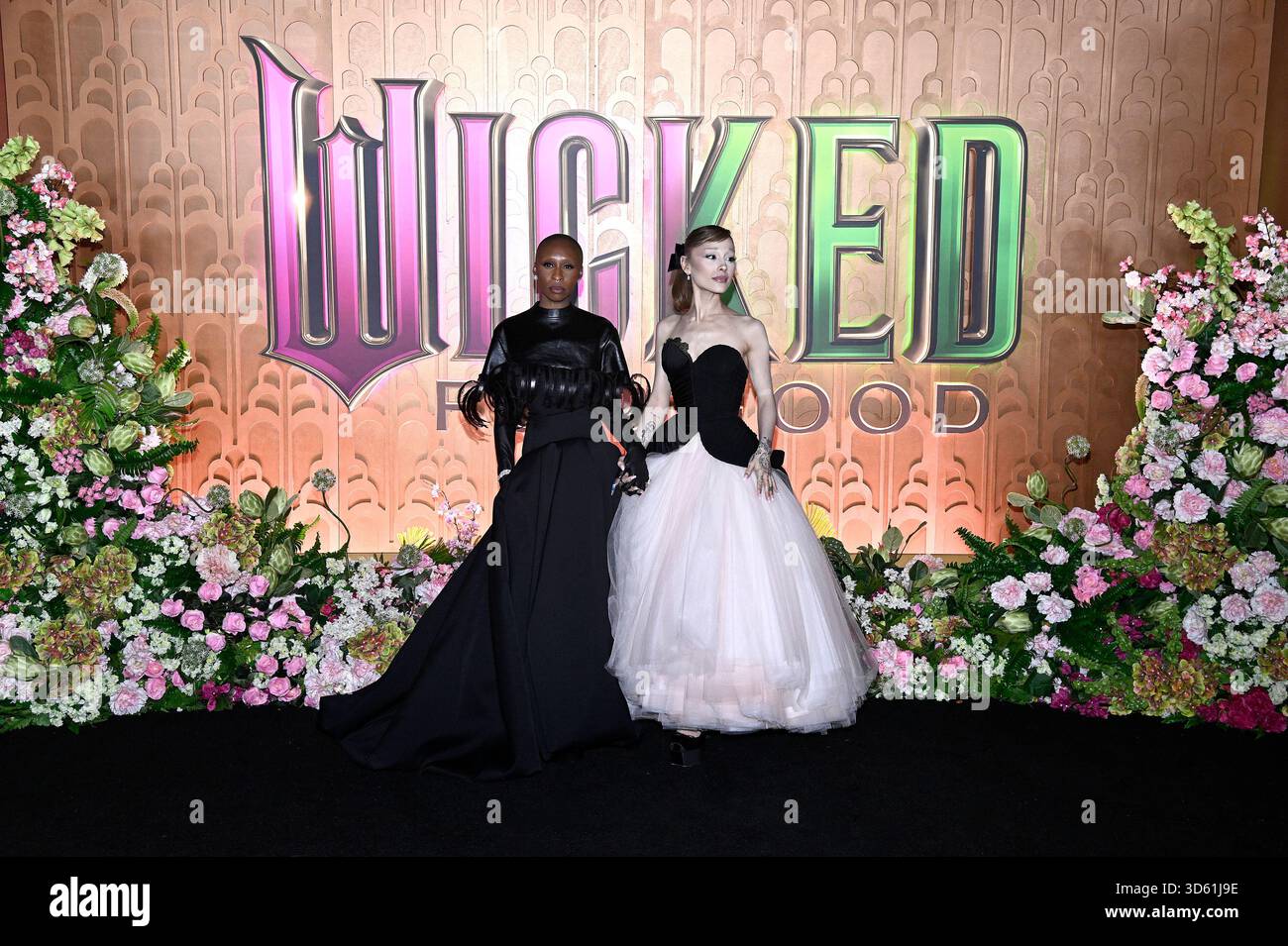 (L-R) Cynthia Erivo and Ariana Grande walking the red carpet at 'Wicked ...