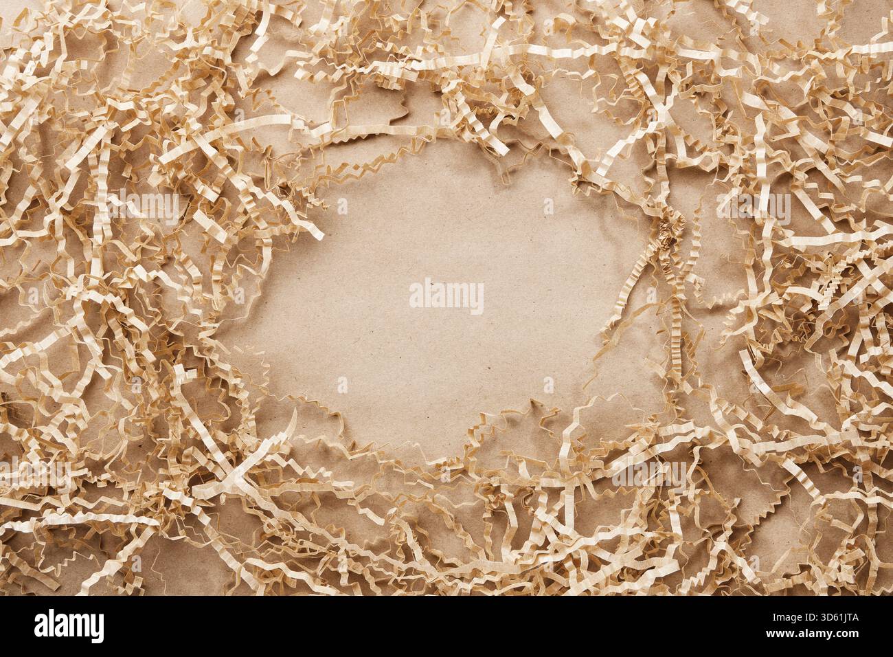 Kraft paper background With natural shredded packaging filler Frame ...