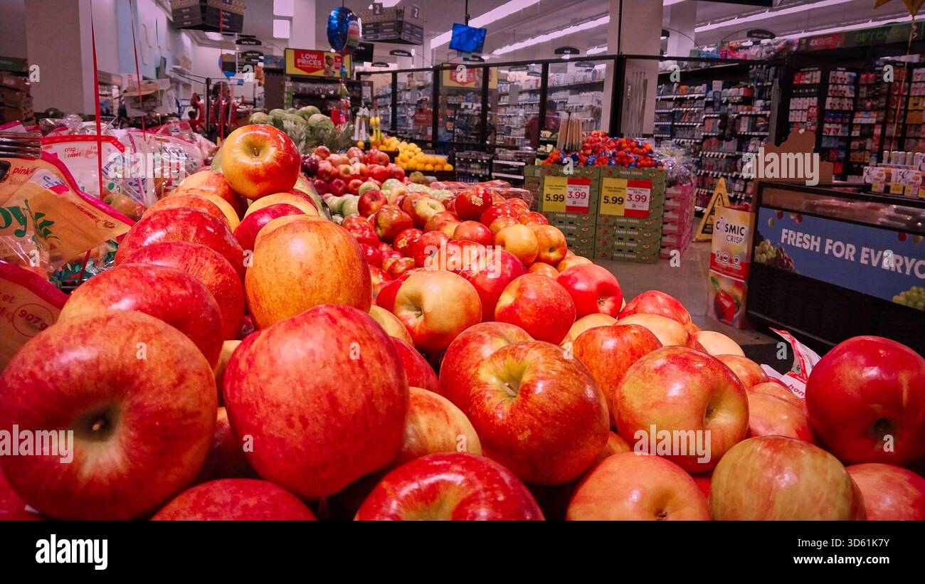Apples stacked in a supermarket's produce department Stock Photo - Alamy