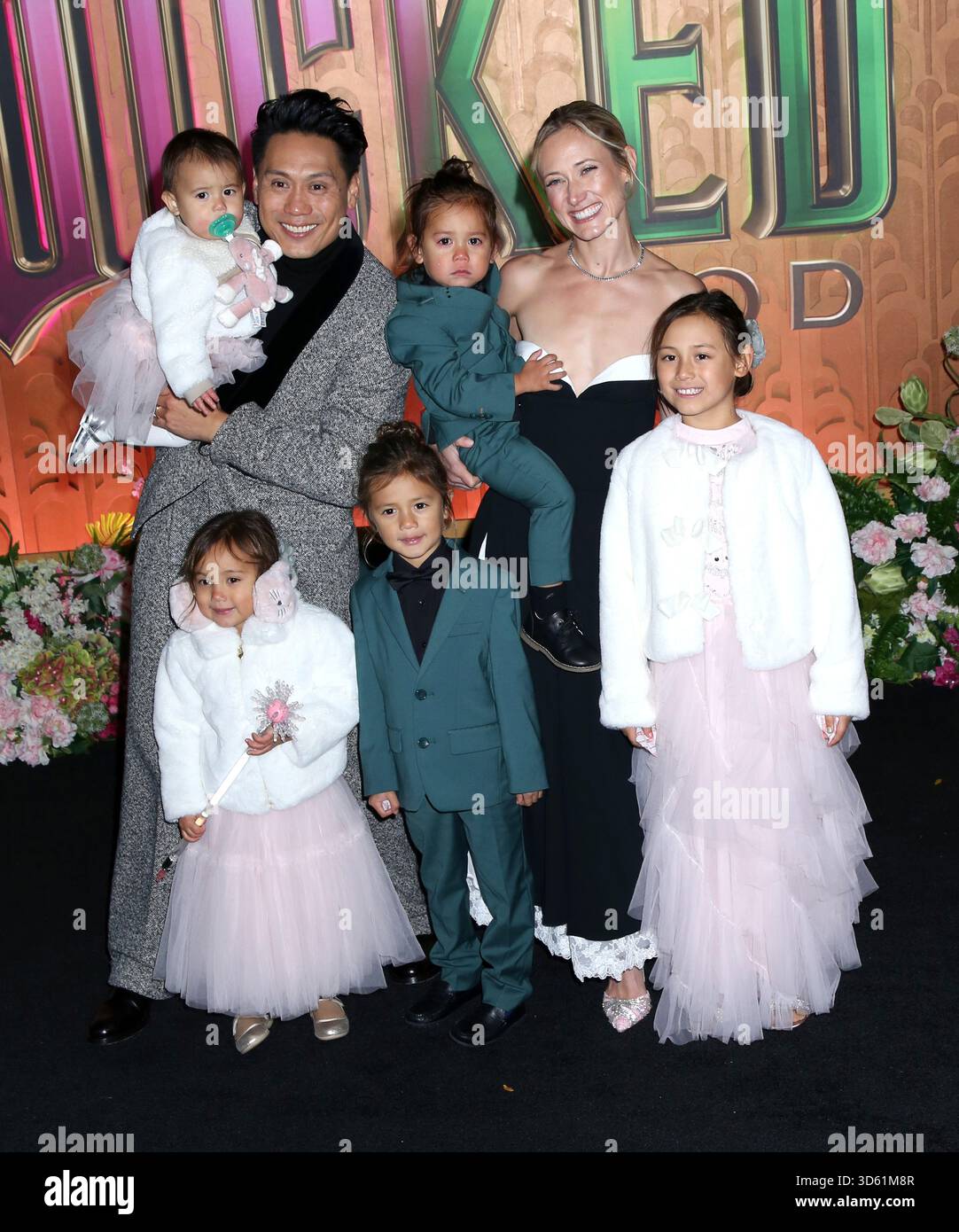 Jon M. Chu, Kristin Hodge and children attending the 'Wicked: For Good ...