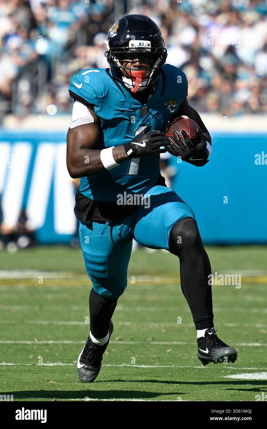 Jacksonville Jaguars running back Travis Etienne Jr. (1) rushes for ...