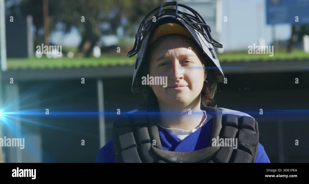 Standing woman catcher wearing helmet chest protector blue jersey at ...