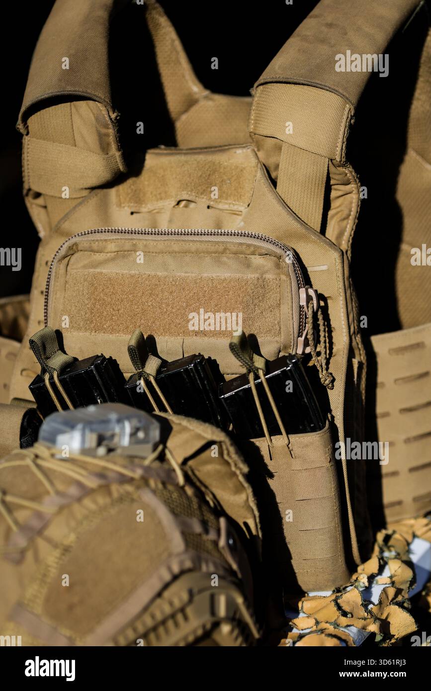 Details with a NATO military vest and helmet during a NATO ...