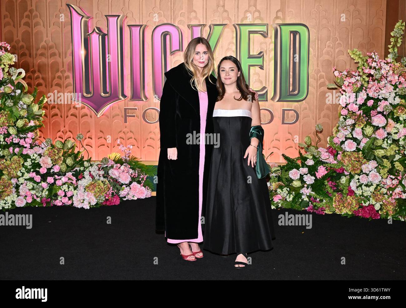 Justine Lupe, left, and guest attend the premiere of "Wicked: For Good ...